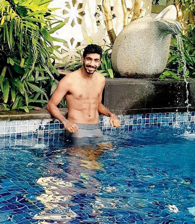 Birthday boy Jasprit Bumrah shows off his six-pack abs in swimming pool Birthday boy Jasprit Bumrah shows off his six-pack abs in swimming pool