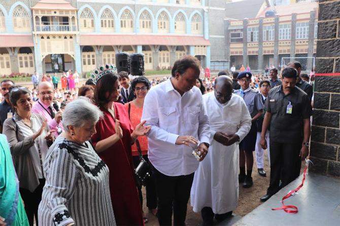 Ashish Shelar is seen cutting the ribbon and inaugurating the Annual School Exhibition of St ...