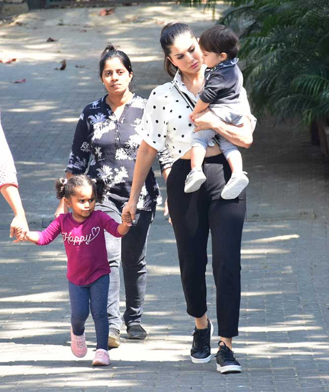 While Sunny Leone was spotted wearing a polka dot shirt, paired with ...