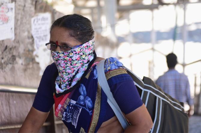 Mumbaikars wear different face mask to protect themselves from COVID-19