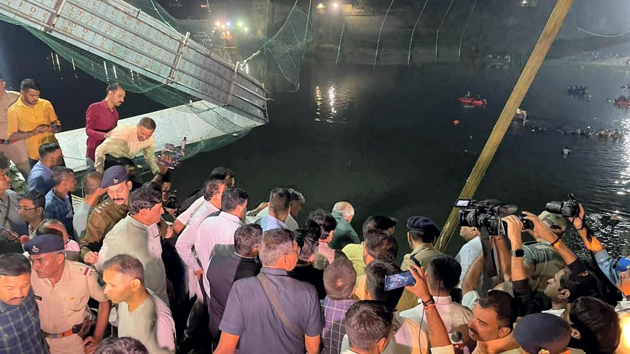 IN PHOTOS: Several dead as century-old cable bridge collapses in Gujarat