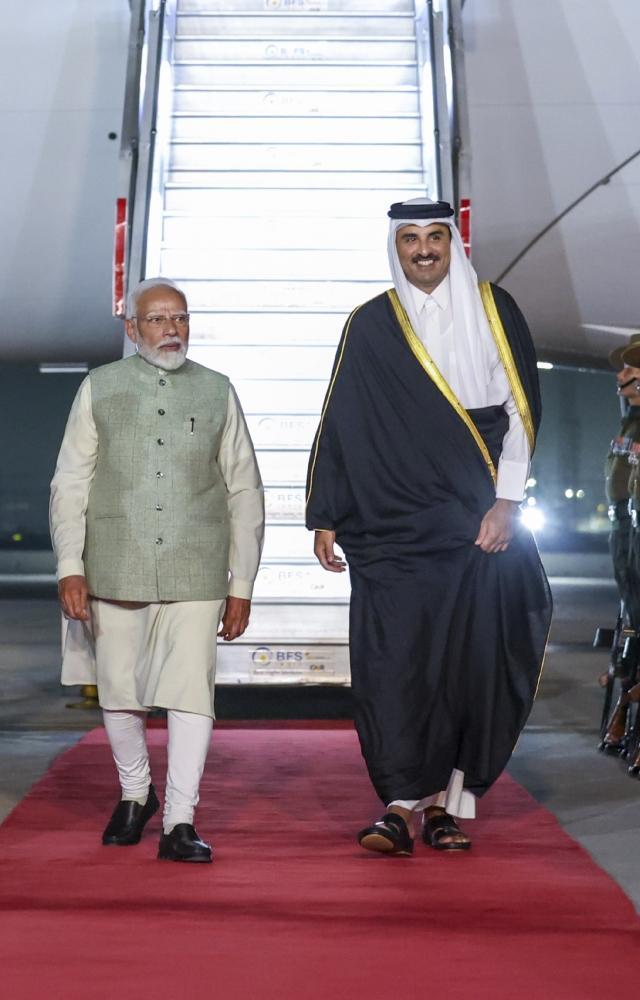 PM Modi receives Emir of Qatar at airport in Delhi