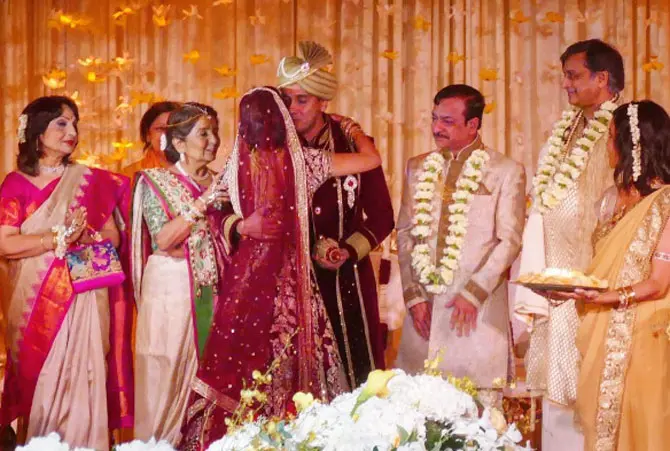 The bride Bhumi Dave and groom Ishaan Tharoor share a warm hug as their ... The bride Bhumi Dave and groom Ishaan Tharoor share a warm hug as their ...